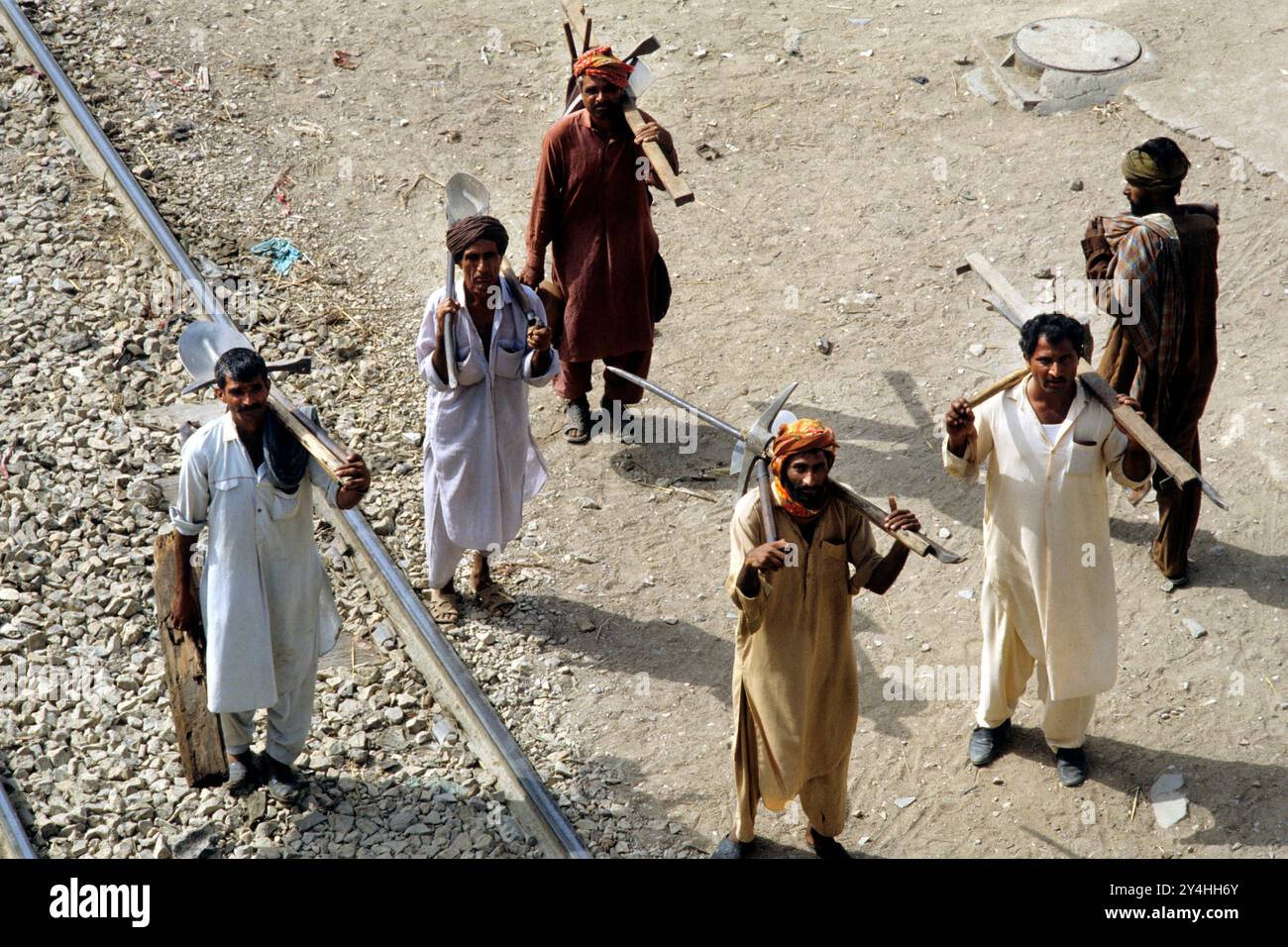 Asia. Pakistan. Group Of Workers In Karachi Stock Photo - Alamy
