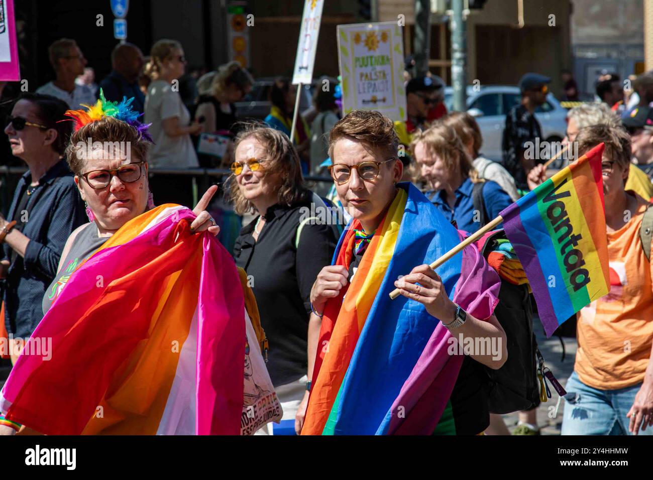 Women with pride flags at Helsinki Pride 2024 parade in Helsinki ...