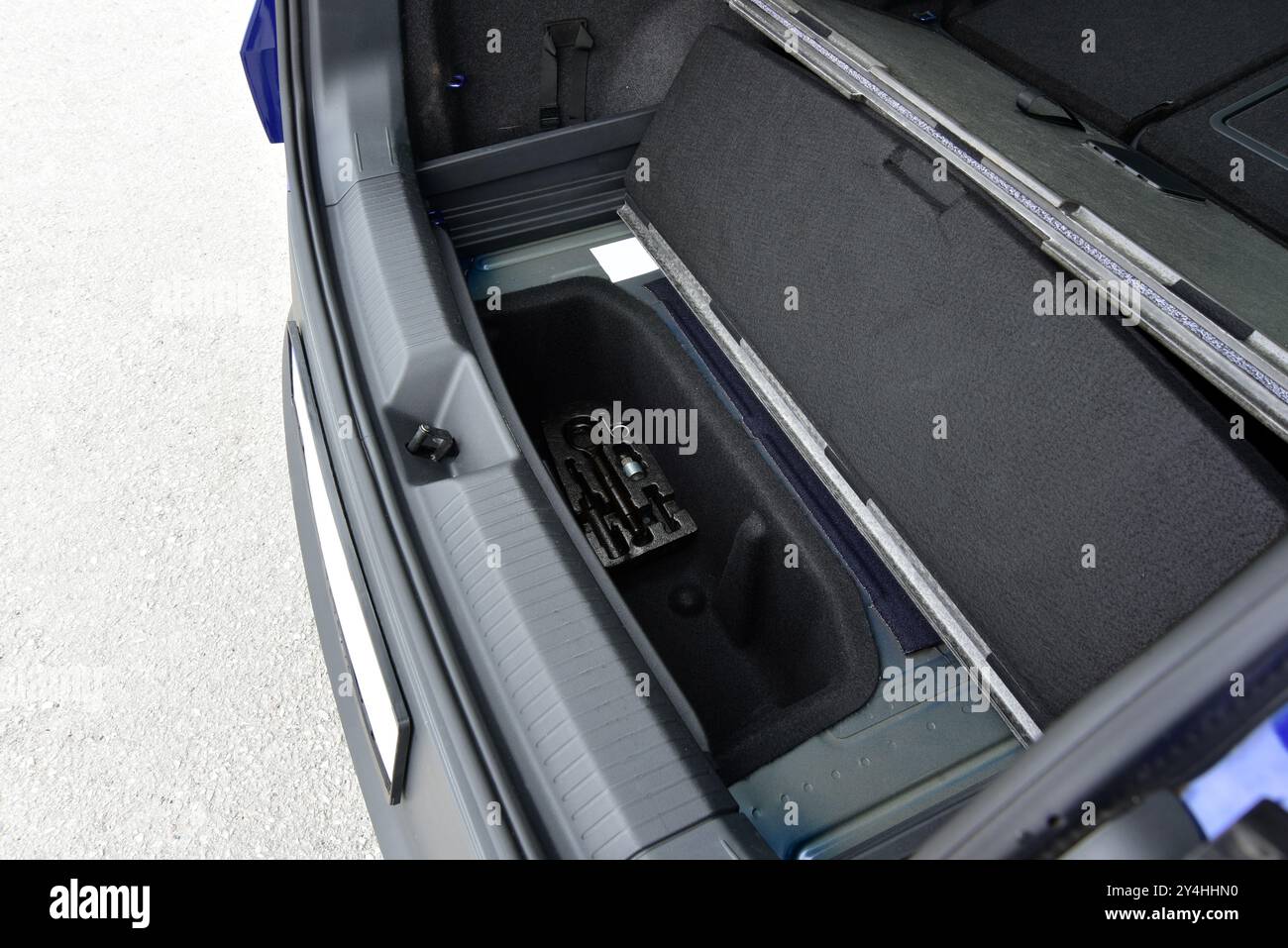 Raised the first floor of the trunk of the car Stock Photo - Alamy