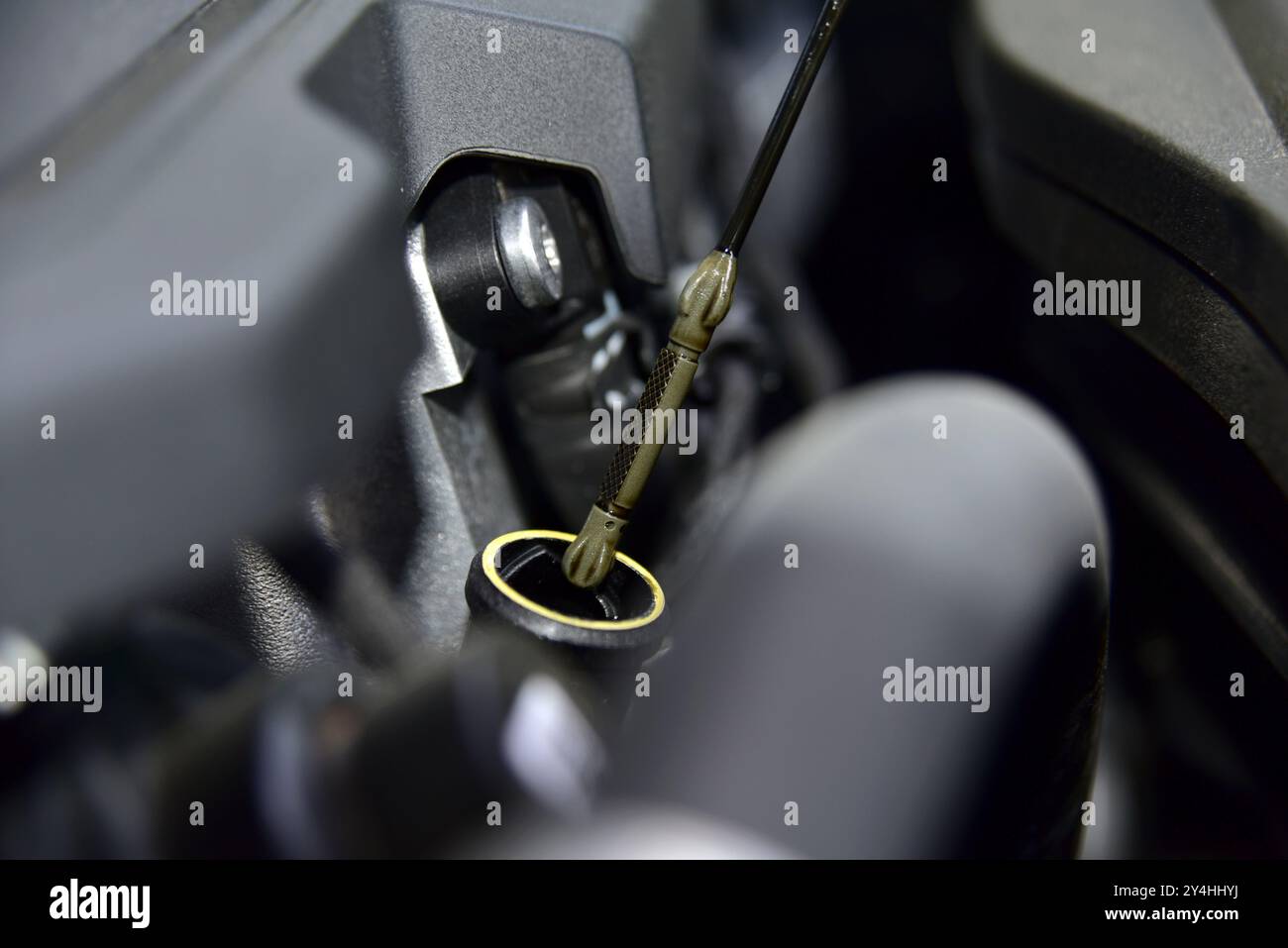 Check the oil level in engine close up. Rod oil level in the passenger ...