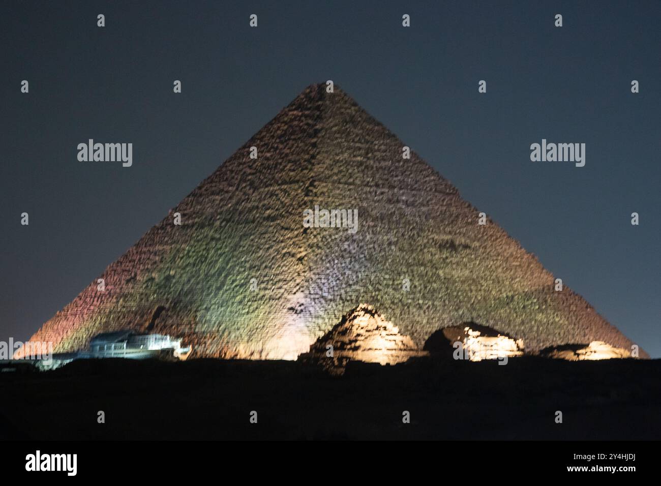 The Great Pyramid complex enlighted at night, Giza, Egypt Stock Photo ...