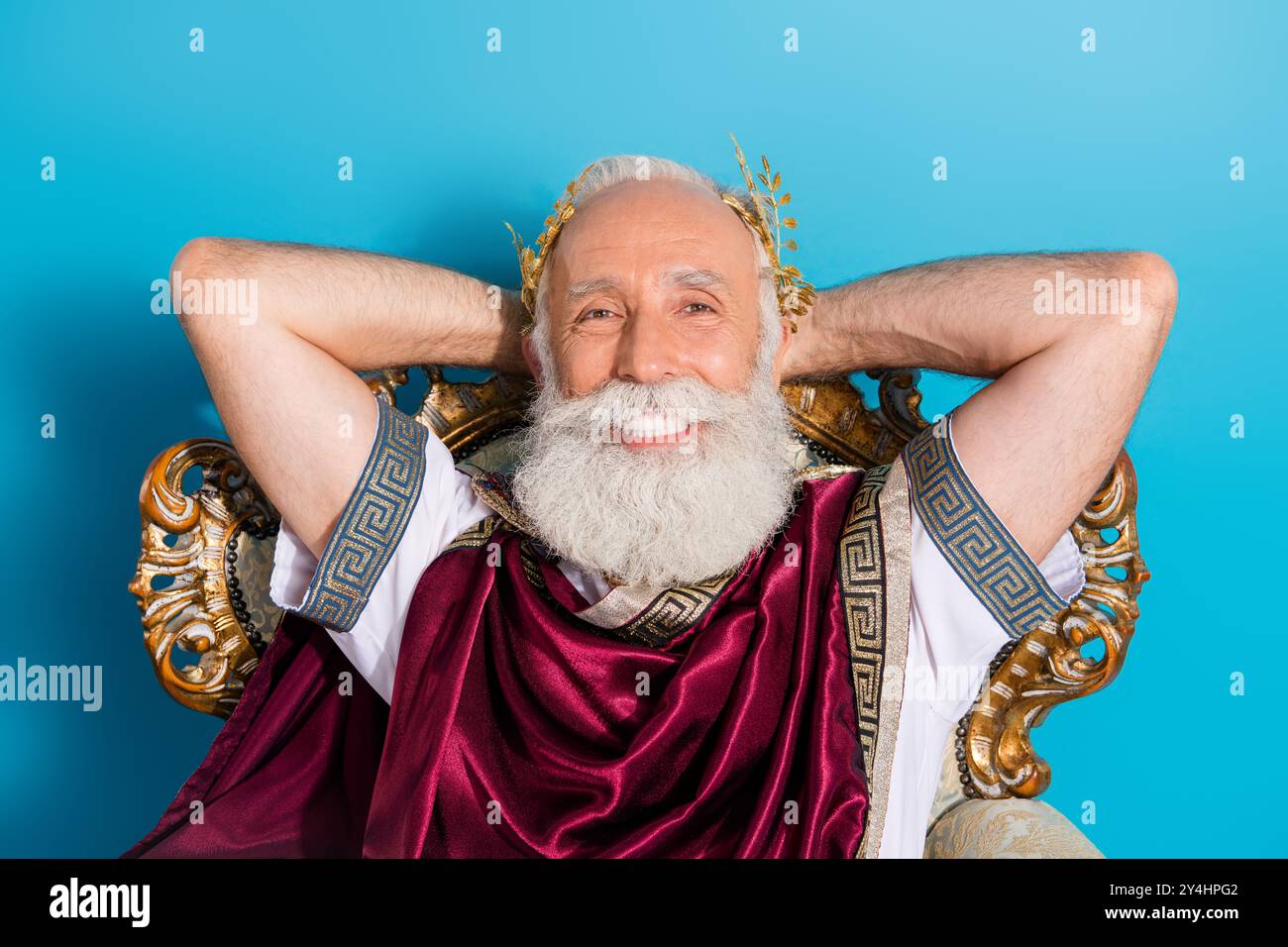 Portrait of positive aged man ancient roman senator outfit relax throne ...