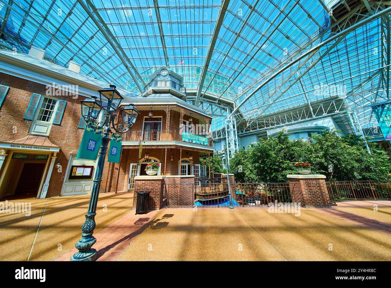 Southern Brick Building in Glass Atrium with Iron Lamp Eye-Level View ...