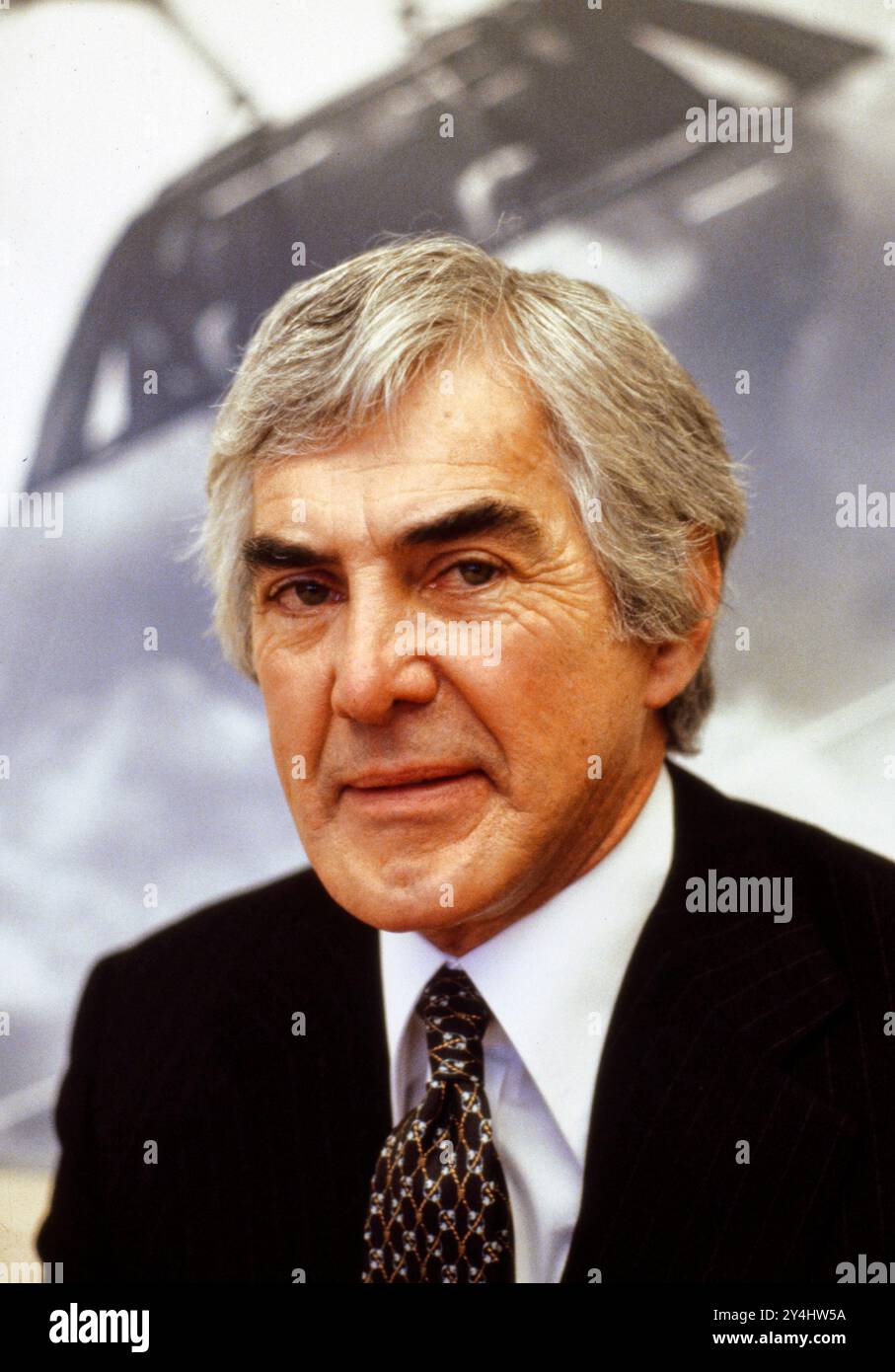 John DeLorean. Portrait of the founder of the DeLorean Motor Company ...