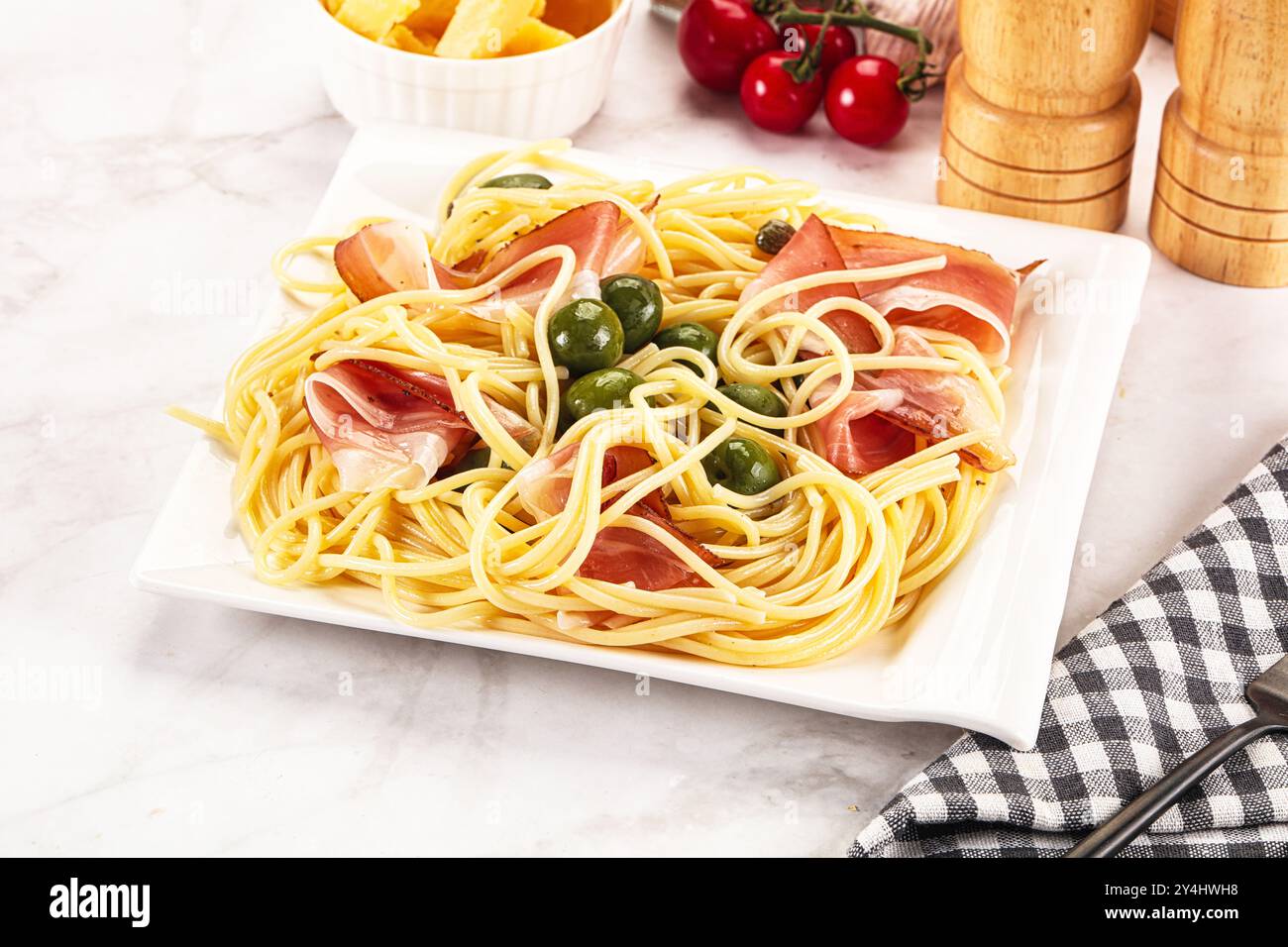 Delicous Pasta spaghetti with olives and jamon Stock Photo - Alamy