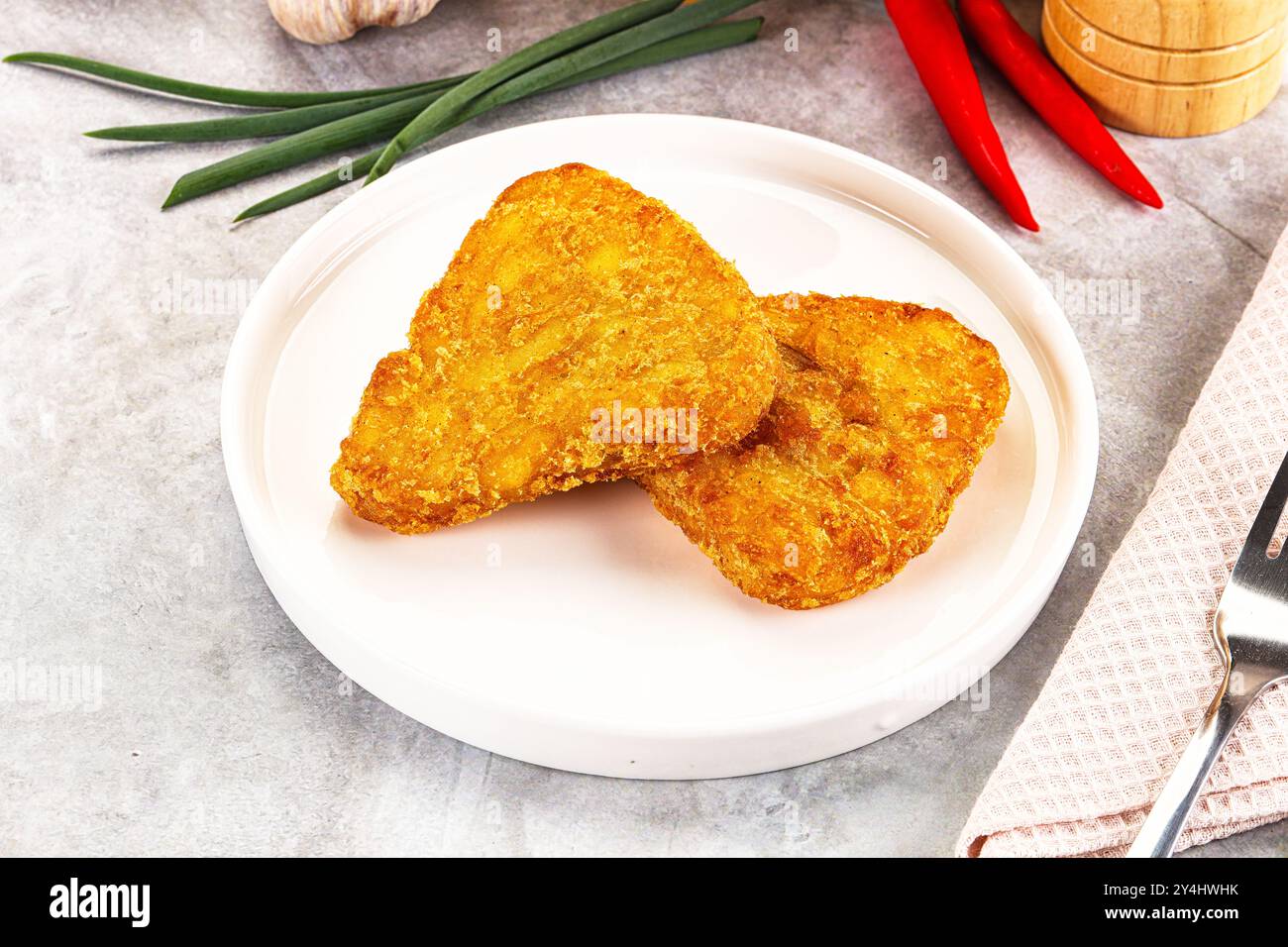 Fried potato hash brown snack for breakfast Stock Photo - Alamy