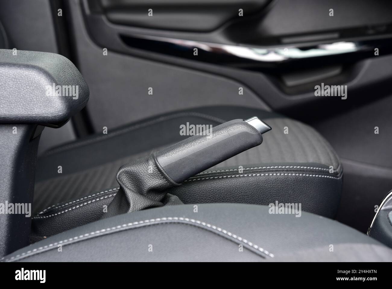 Manual brake in interior of modern car close up Stock Photo - Alamy