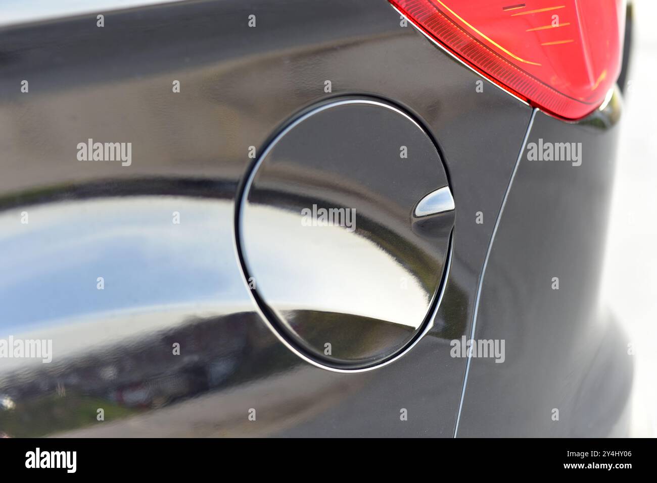 Gas tank metal cover on a passenger car Stock Photo - Alamy