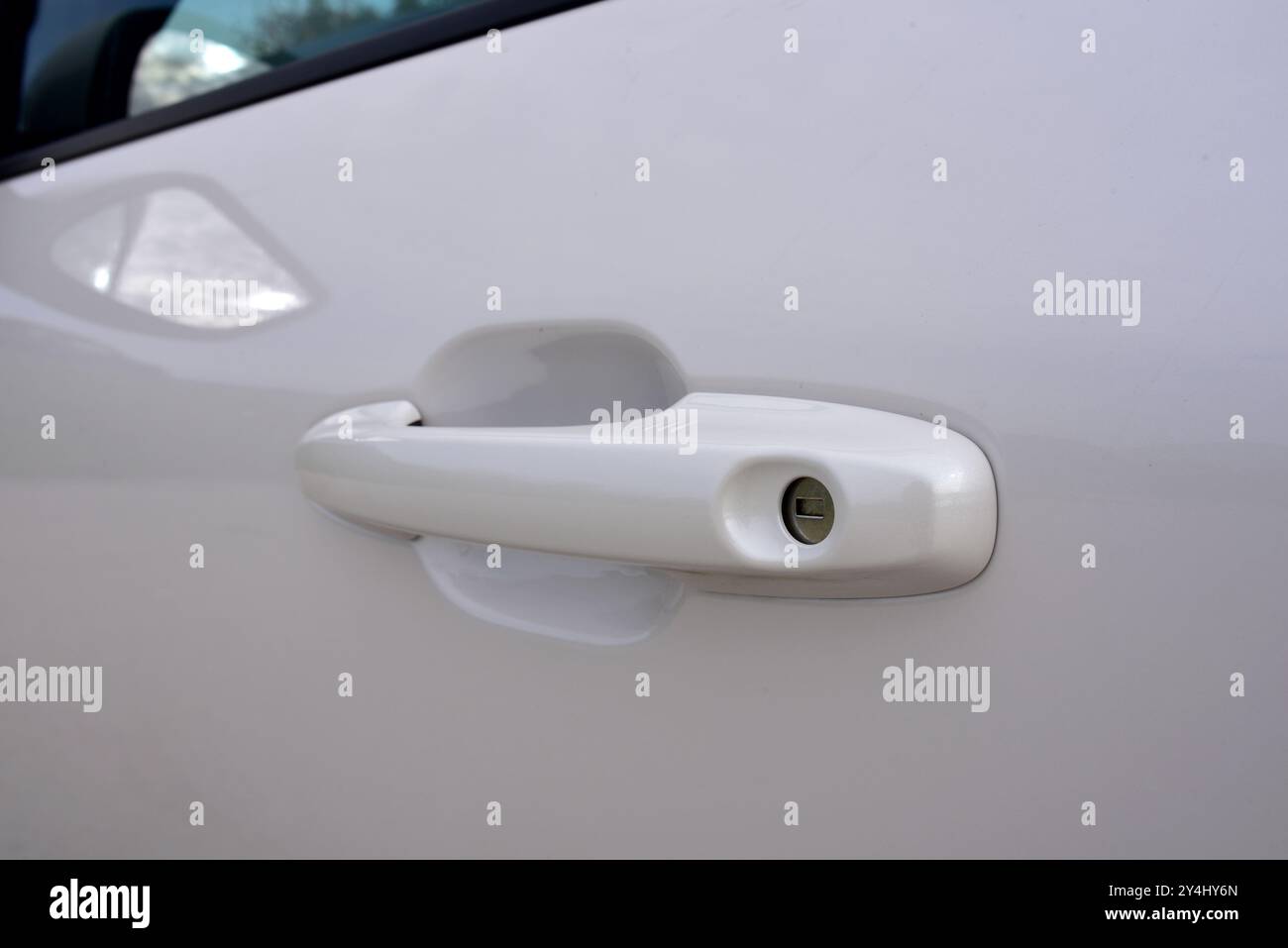 Handle on the passenger car door Stock Photo - Alamy