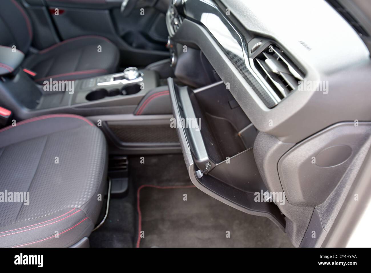 Glove box on the console of a passenger car. Compartment in front of ...