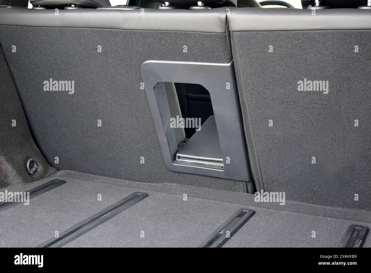 Ski hatch on the rear seat backs in the car Stock Photo - Alamy