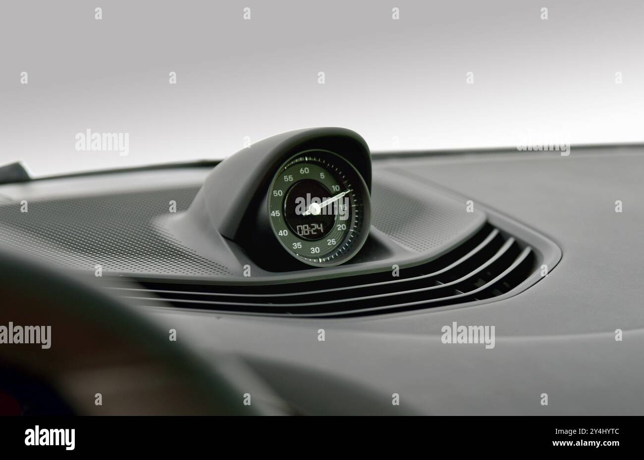 Automotive clock and ventilation holes Stock Photo - Alamy