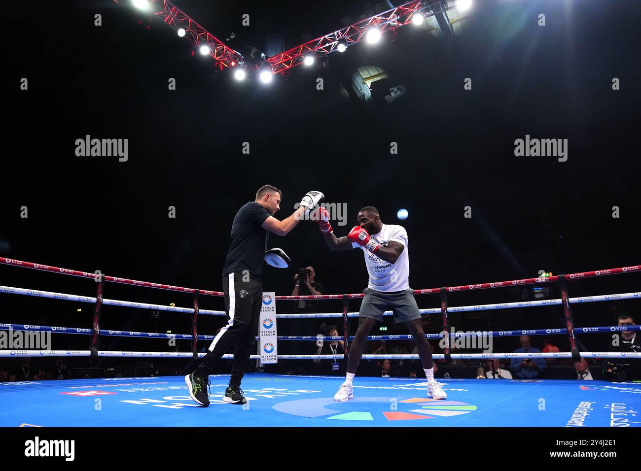 Boxer Ishmael Davis (right) during an open workout at Wembley Arena ...