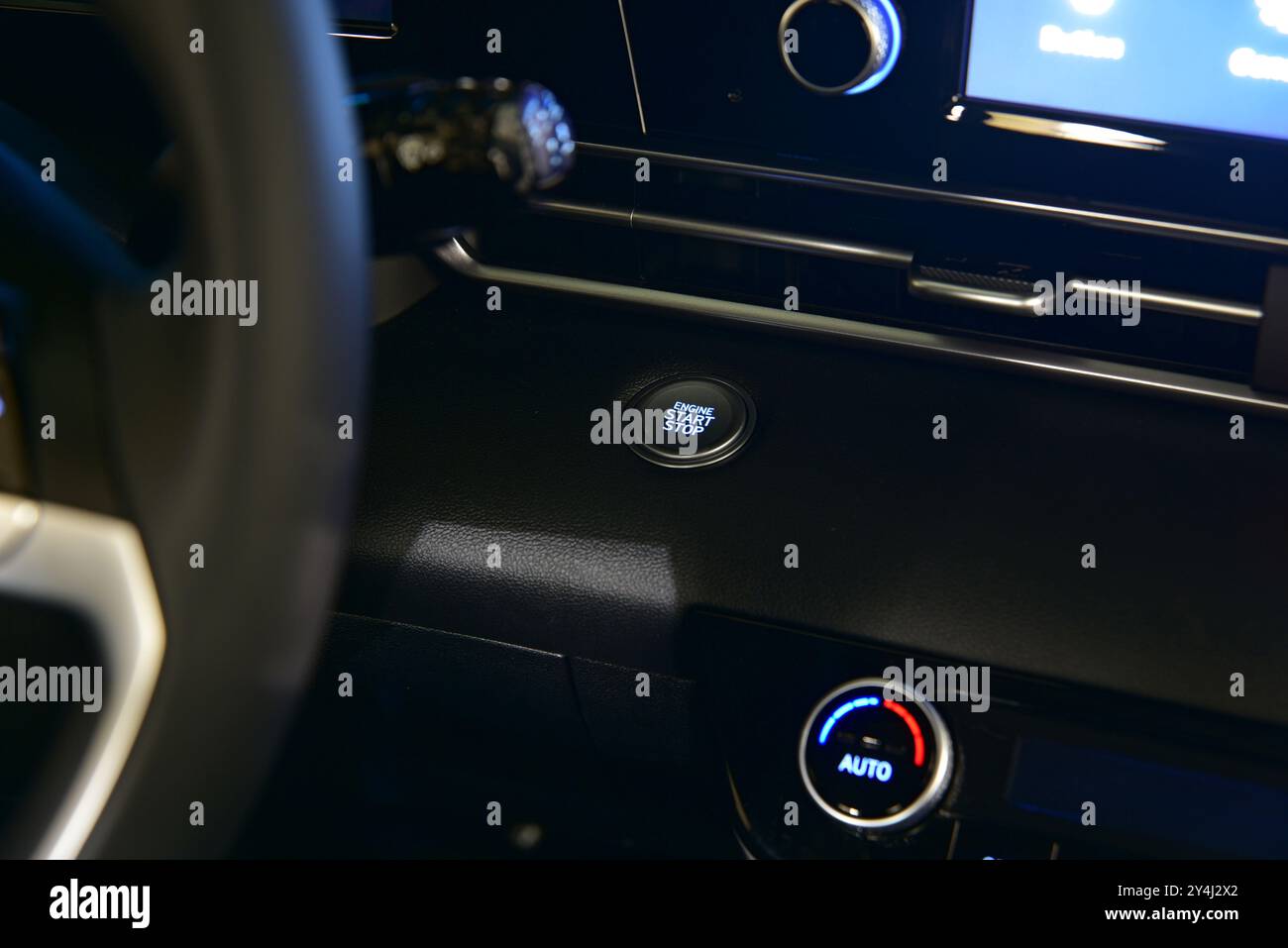 Start stop engine button on a modern car dashboard Stock Photo - Alamy