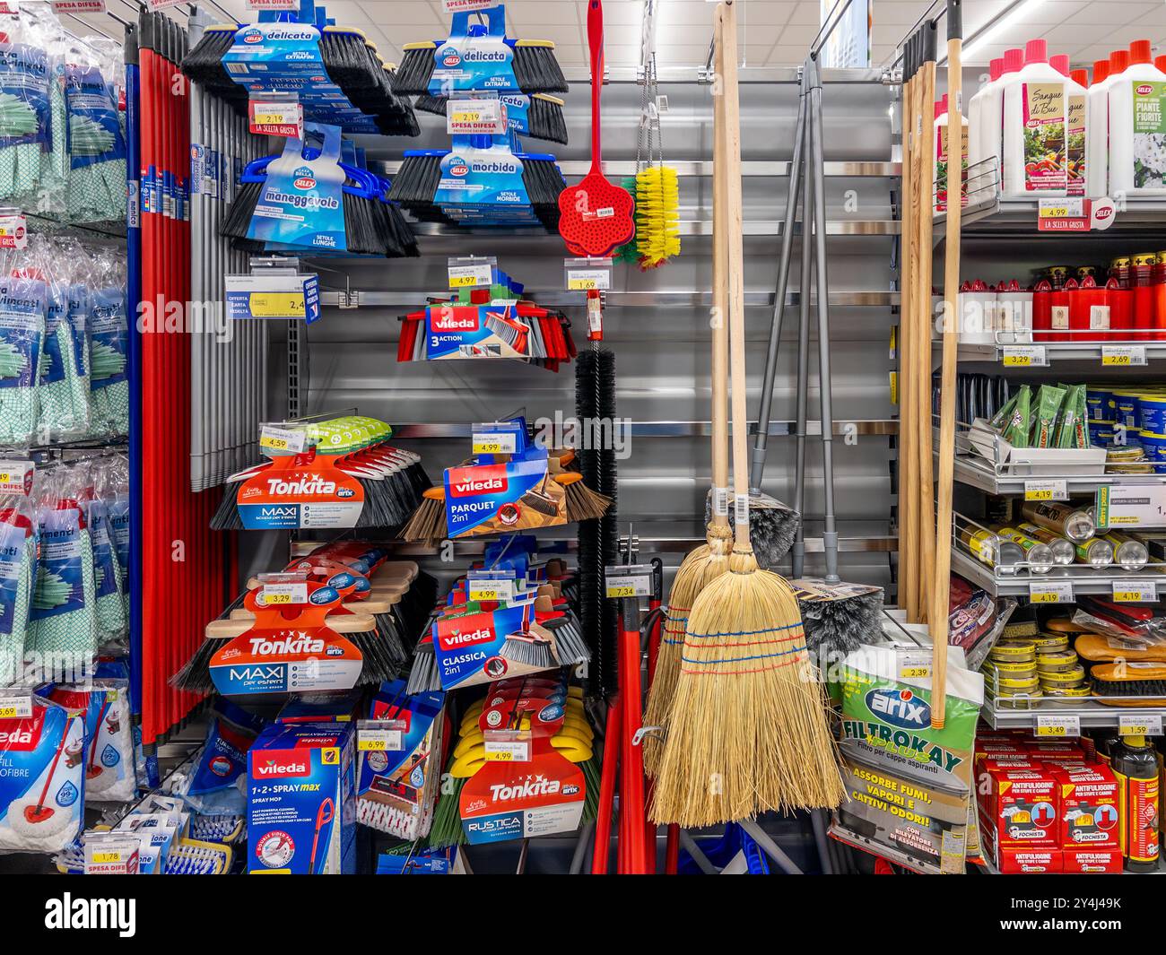 Italy - September 18, 2024: Brooms and broom handles of various types ...