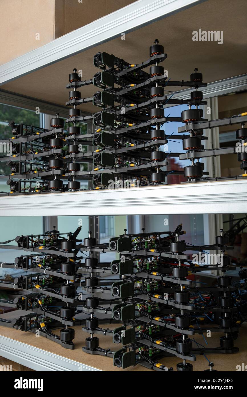 Fpv racing drones (first point view) aircraft on shelves. Four-engine ...