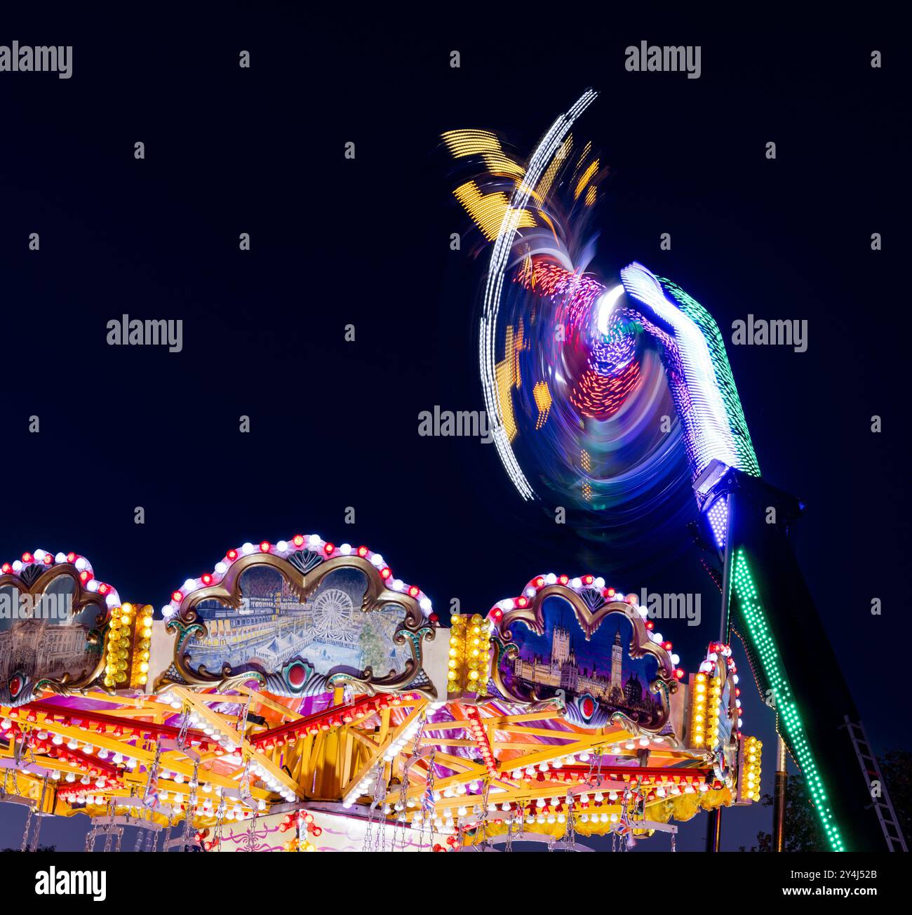 Light traces from the 'Equinox' fairground ride at the annual 'Witney ...