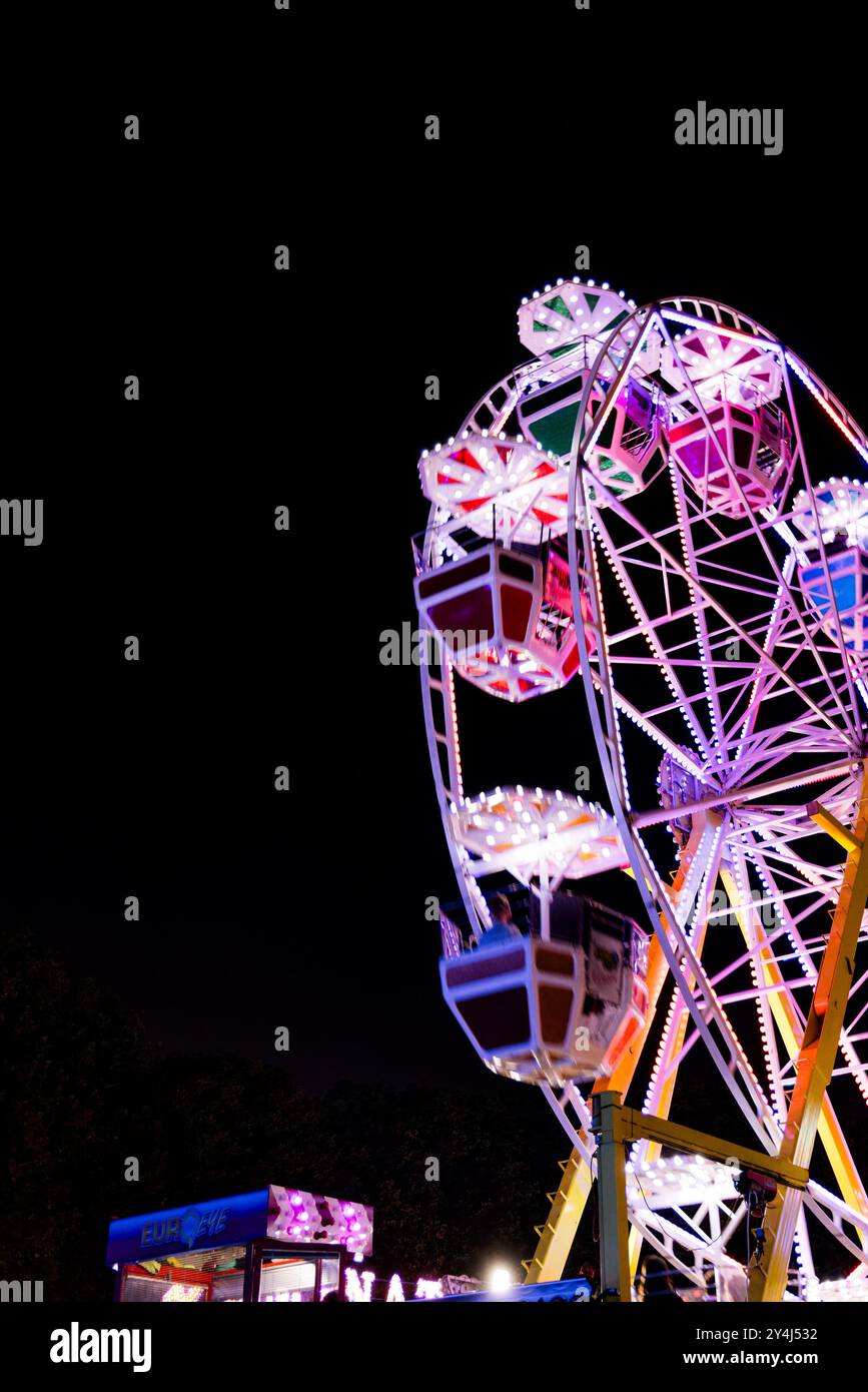 Light trails from the Ferris Wheel fairground ride at the annual ...