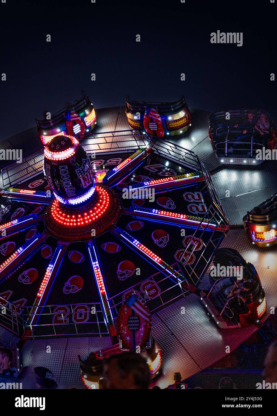 Light trails from the 'Superbowl' fairground ride at the annual 'Witney ...