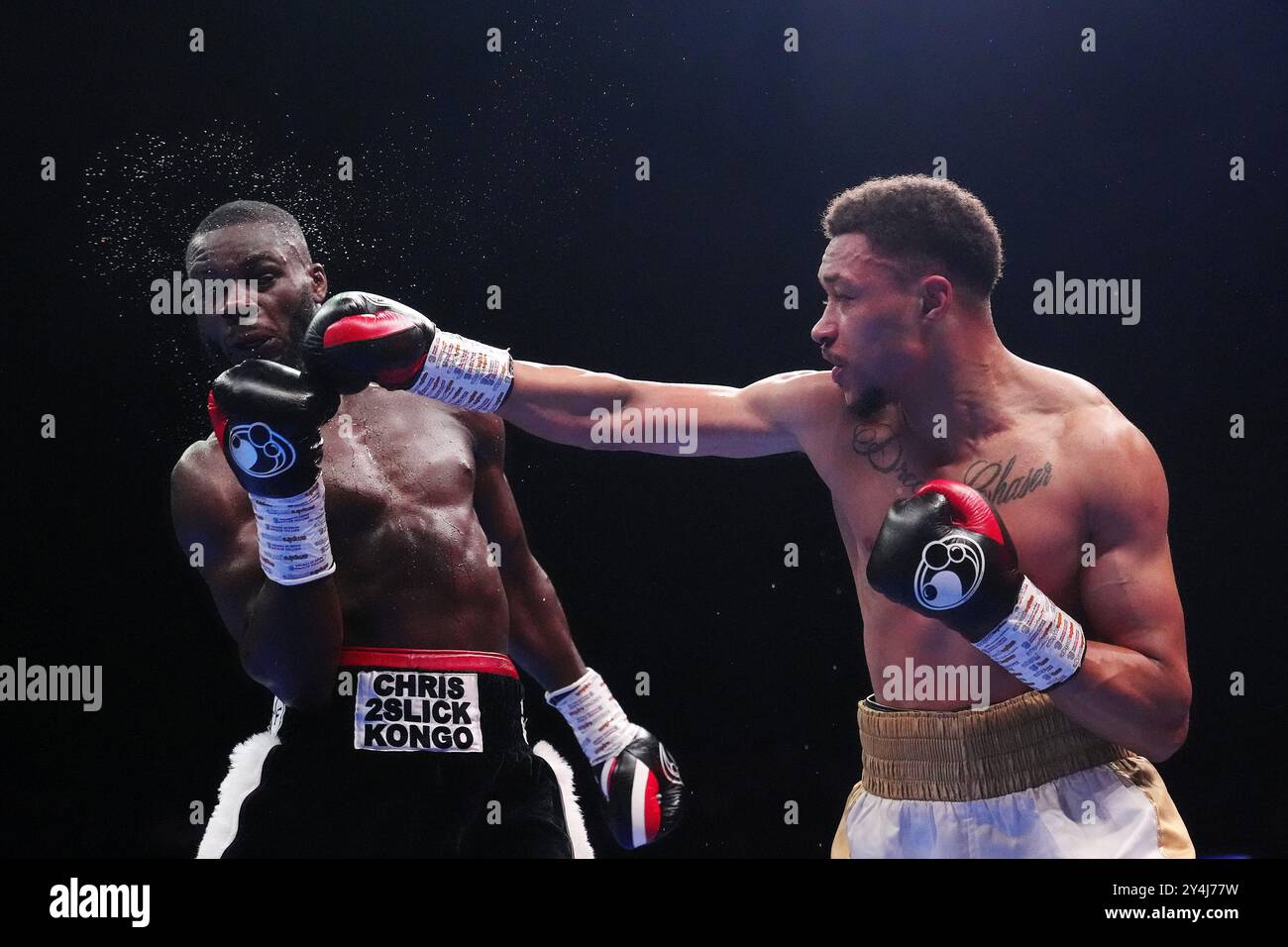 Jacob Quinn (right) lands a punch against Chris Kongo in the first Workout Live fight at Wembley ...