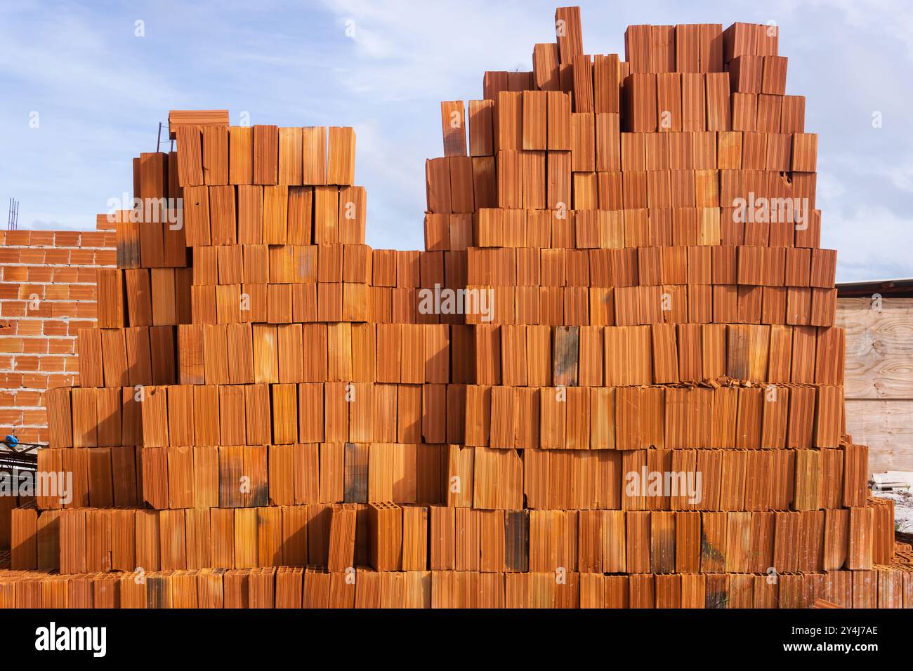 Brazilian clay bricks piled on a home construction site in Brazil Stock ...