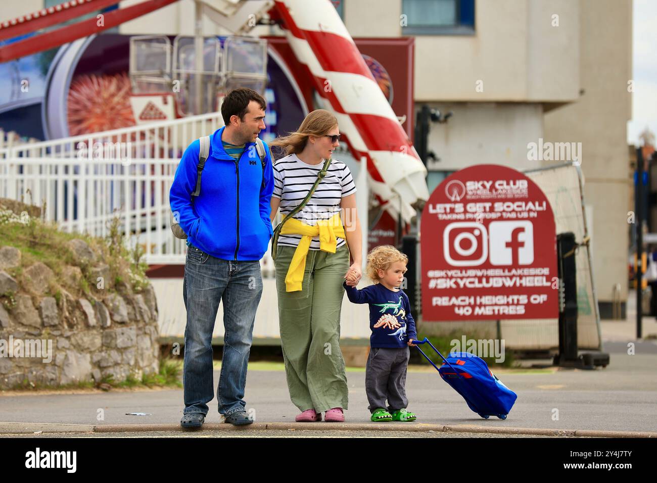 The croc shoe family on holiday in Weston Super Mare Stock Photo - Alamy