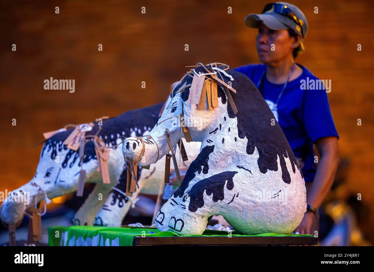 The image shows the mascot 'Nong Fad Fun' a white elephant that has ...