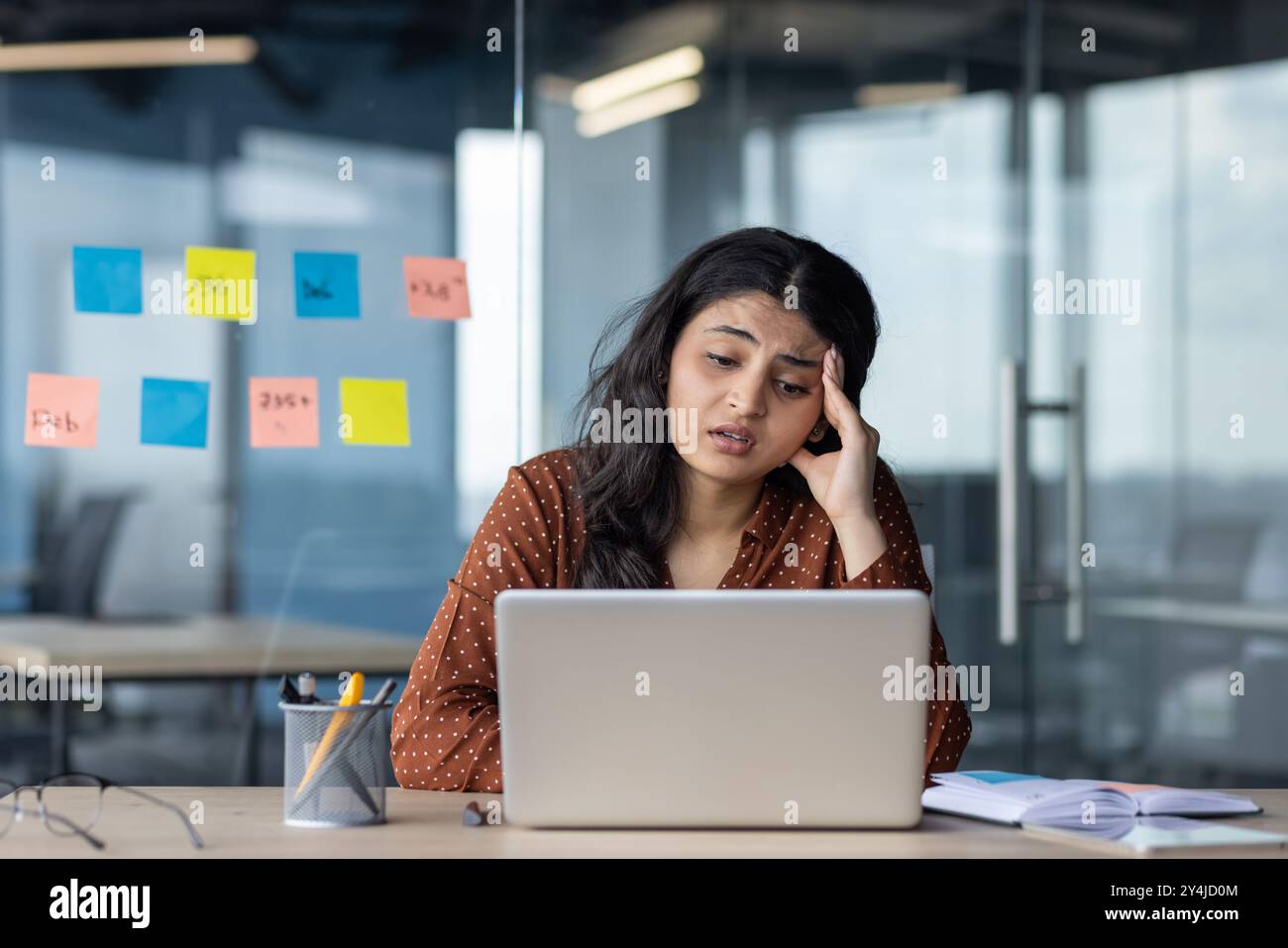 Upset and sad woman reading email, businesswoman looking at laptop ...