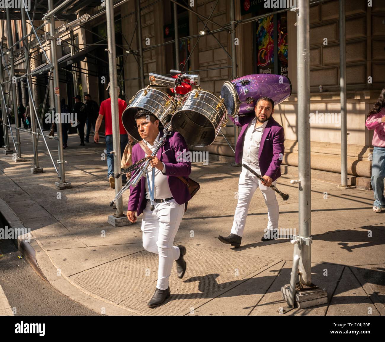 Band members pack up their instruments after the Mexican Independence ...
