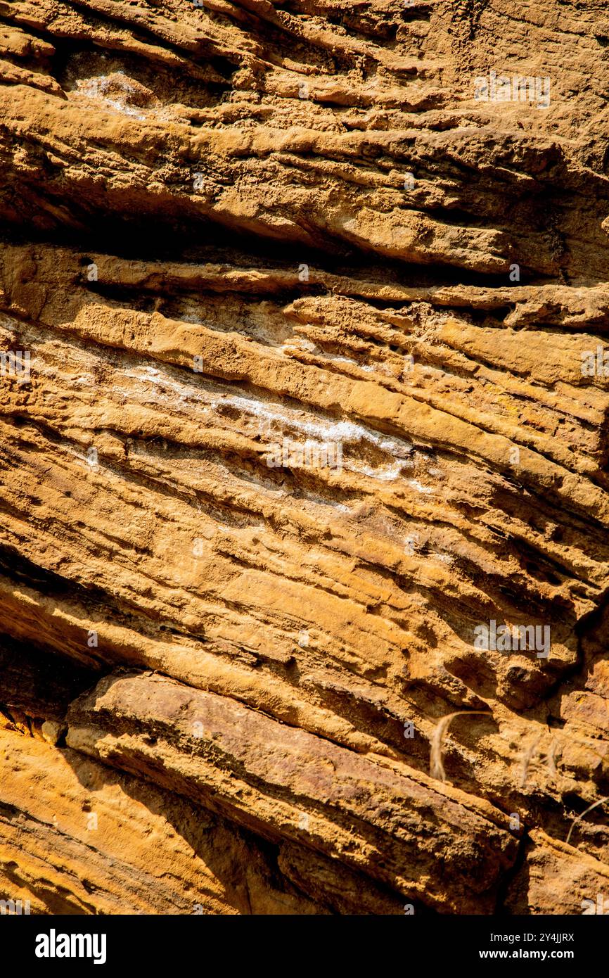 Sandstone rock wall landscape showing detail and filling the frame ...
