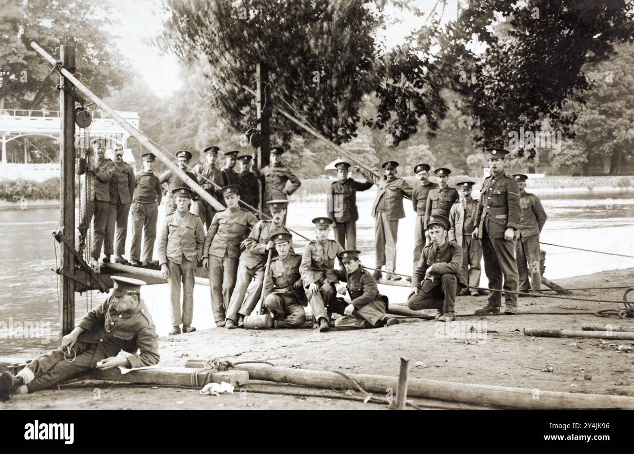 A group of Royal Engineers sappers practicing bridge building in Henley ...