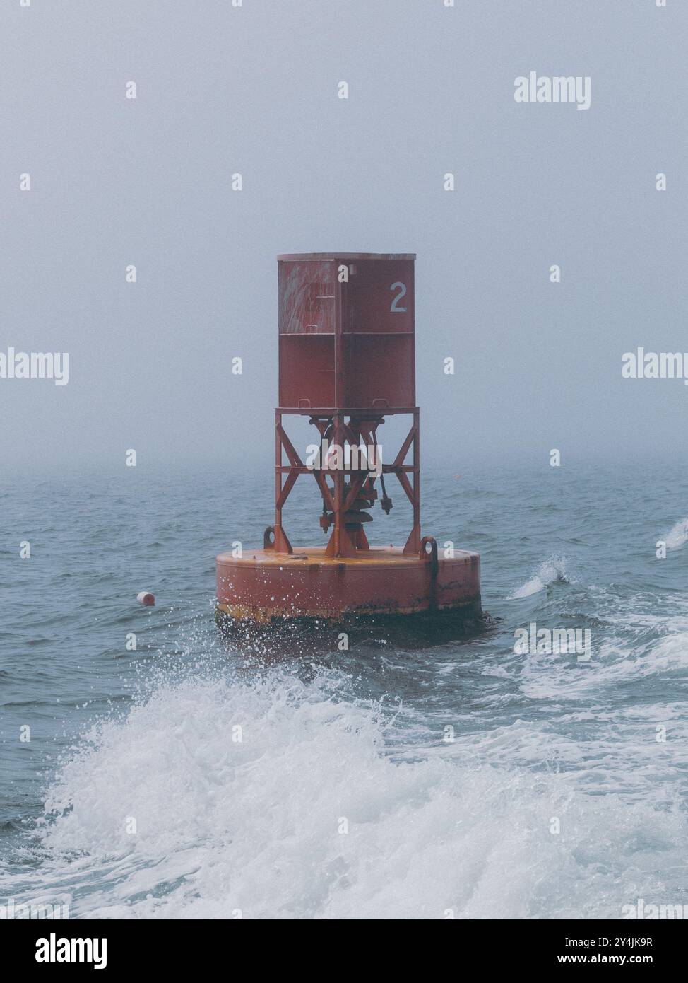Bell Buoy in Ocean Waves and fog in Maine Stock Photo - Alamy