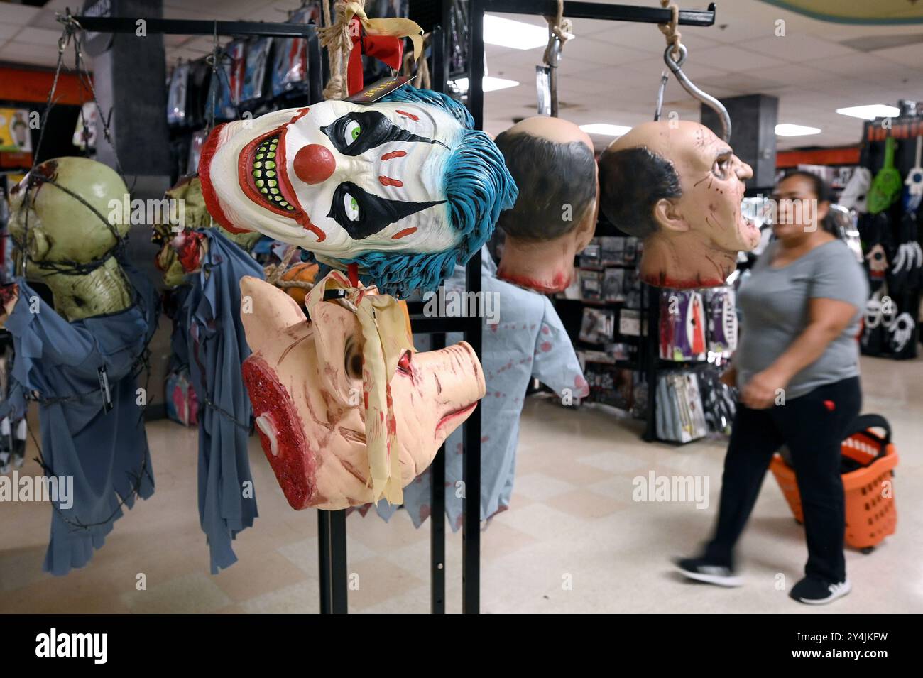New York, USA. 18th Sep, 2024. Halloween masks on display inside a ...
