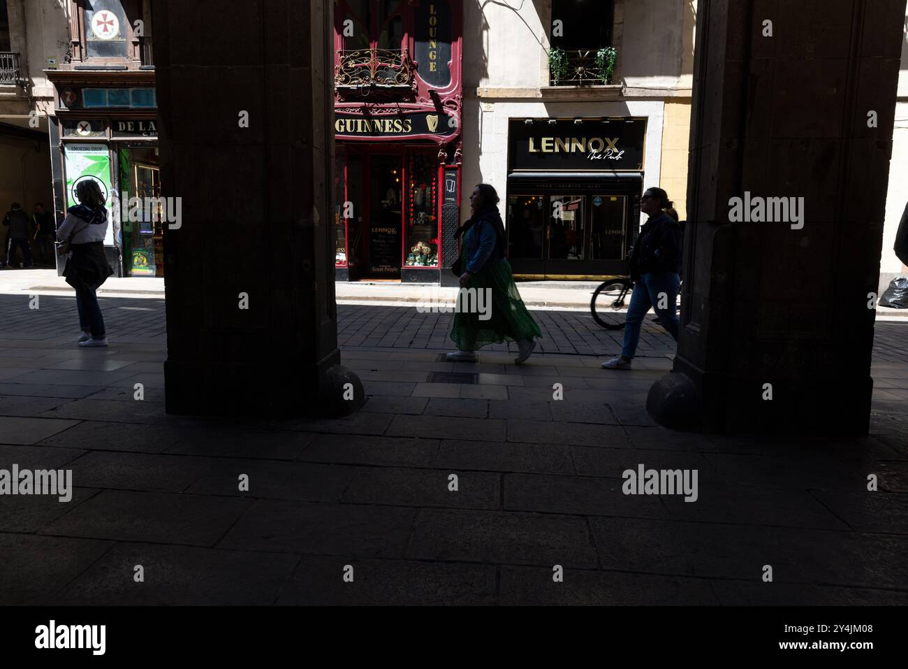 People stroll through the streets near the entrance to Placa Reial in ...