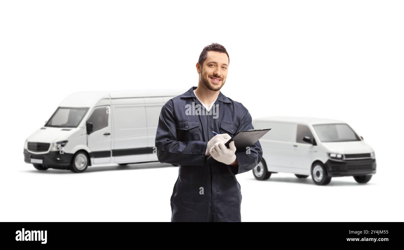 Van driver in a uniform standing with a clipboard isolated on white ...