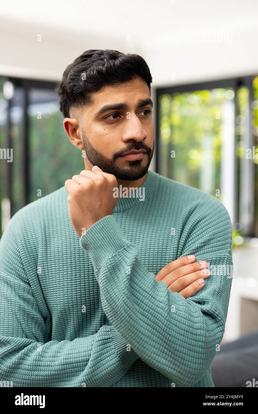 Thinking deeply indian man in hi-res stock photography and images - Alamy