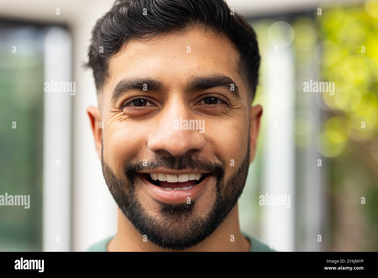 Portrait young indian man face hi-res stock photography and images - Alamy