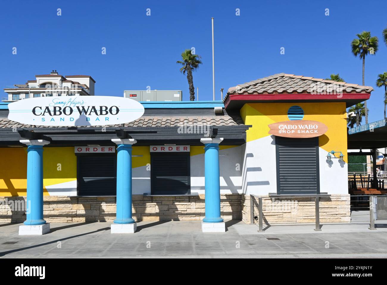HUNTINGTON BEACH, CALIFORNIA - 17 SEPT 2024: The Cabo Wabo Sand Bar on the boardwalk near the ...