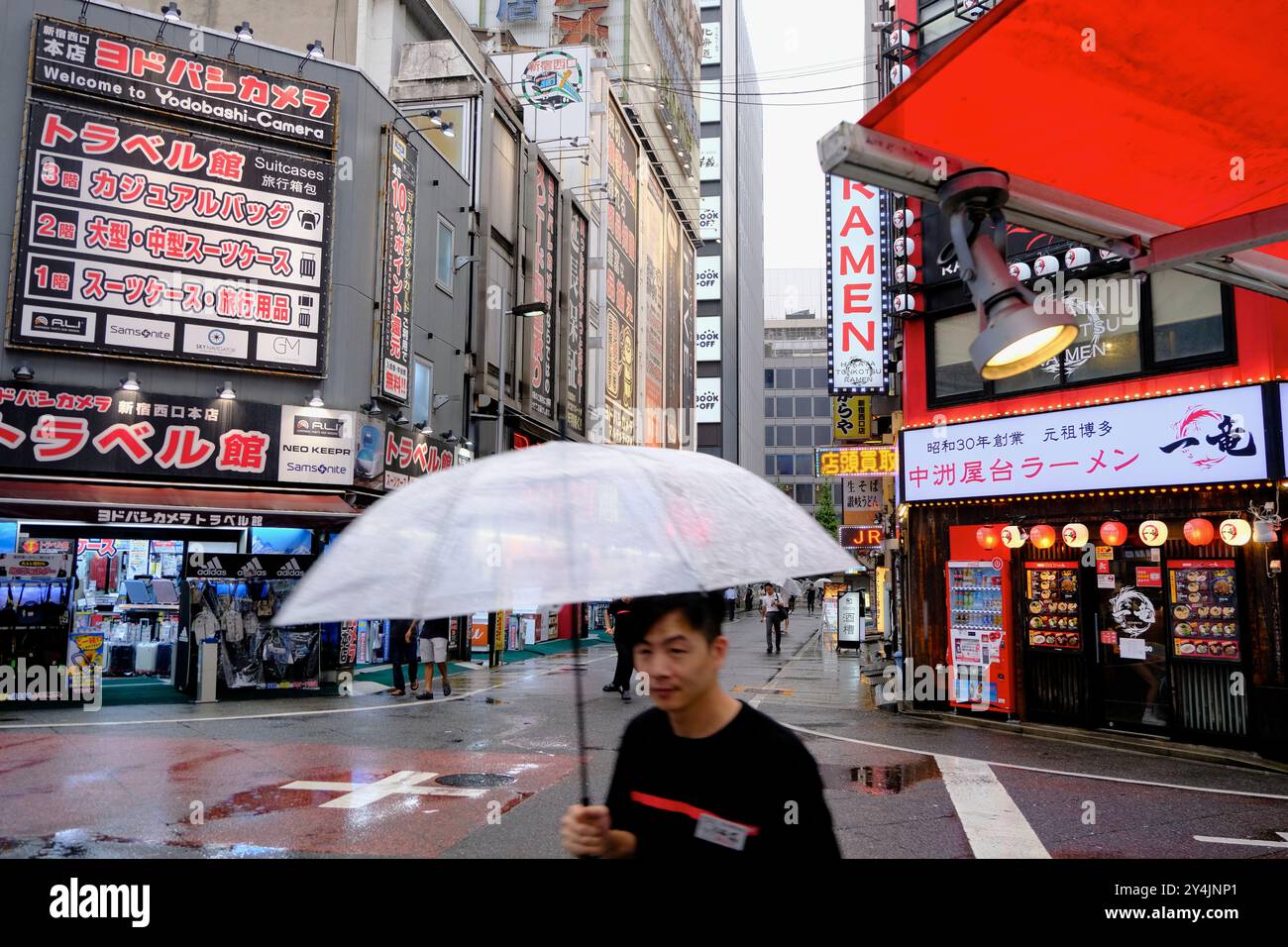 Stores and restaurants lined up the street of Nishishinjuku (West ...