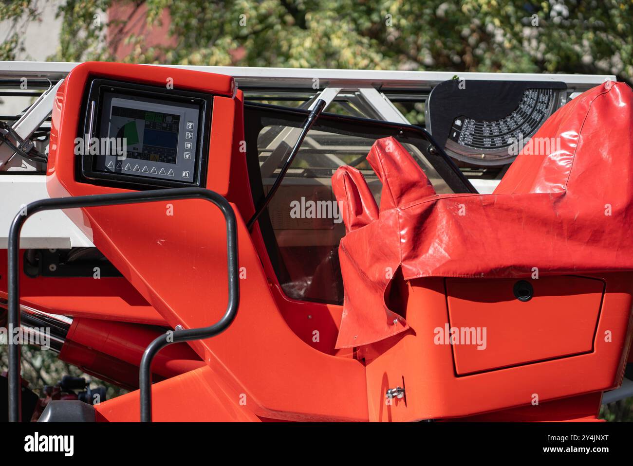 automated red console and control panel of fire truck elevated extended ...