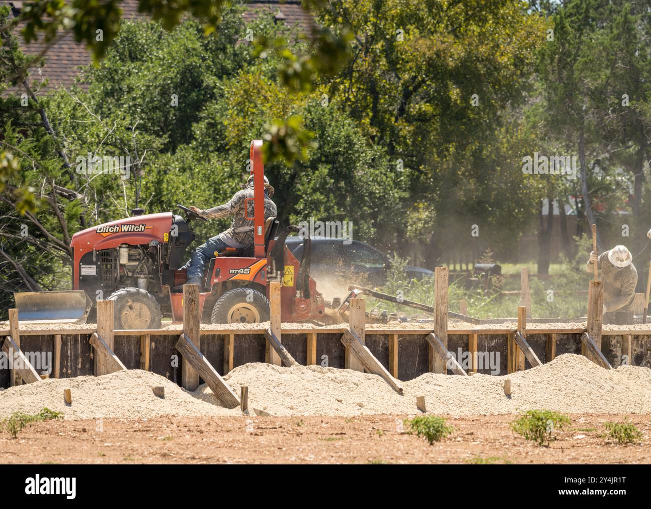 Georgetown, TX - September 10, 2024: Ditch Witch tractor creating the ...