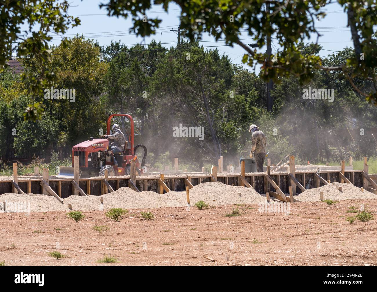 Georgetown, TX - September 10, 2024: Ditch Witch tractor creating the ...