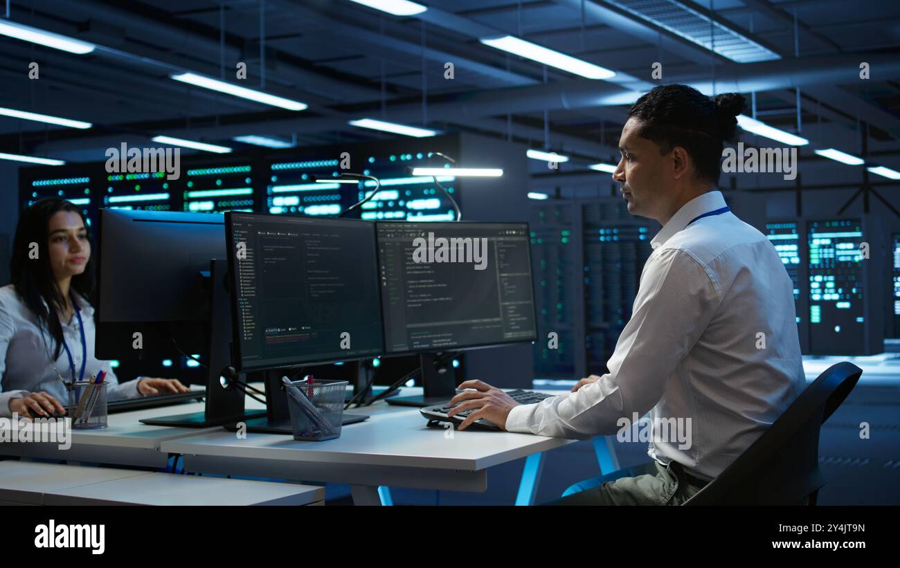 Engineer overseeing data center, making improvements and updates to ...