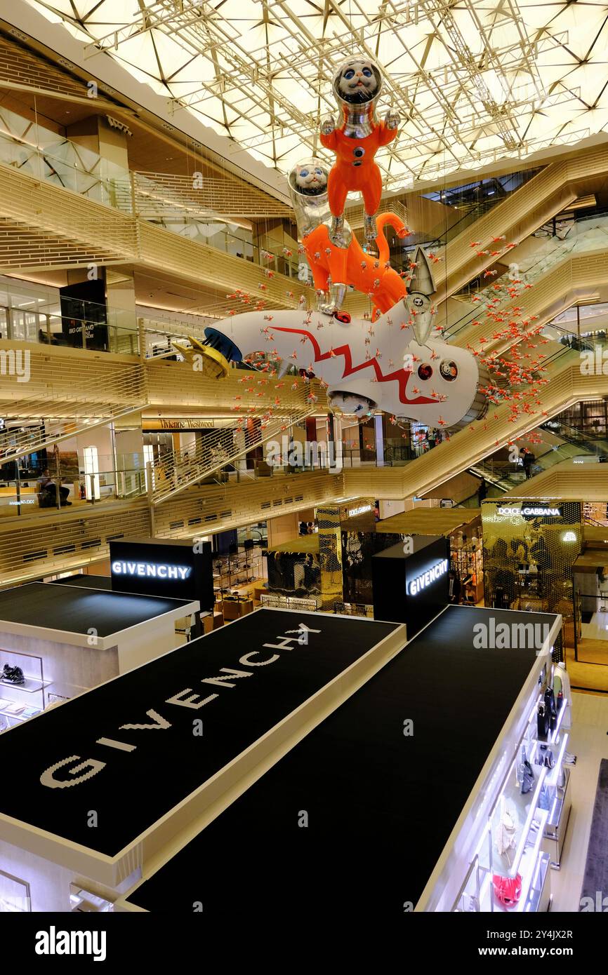 The atrium of Ginza Six luxury shopping complex decorating with the Japanese artist Kenji Yanobe ...