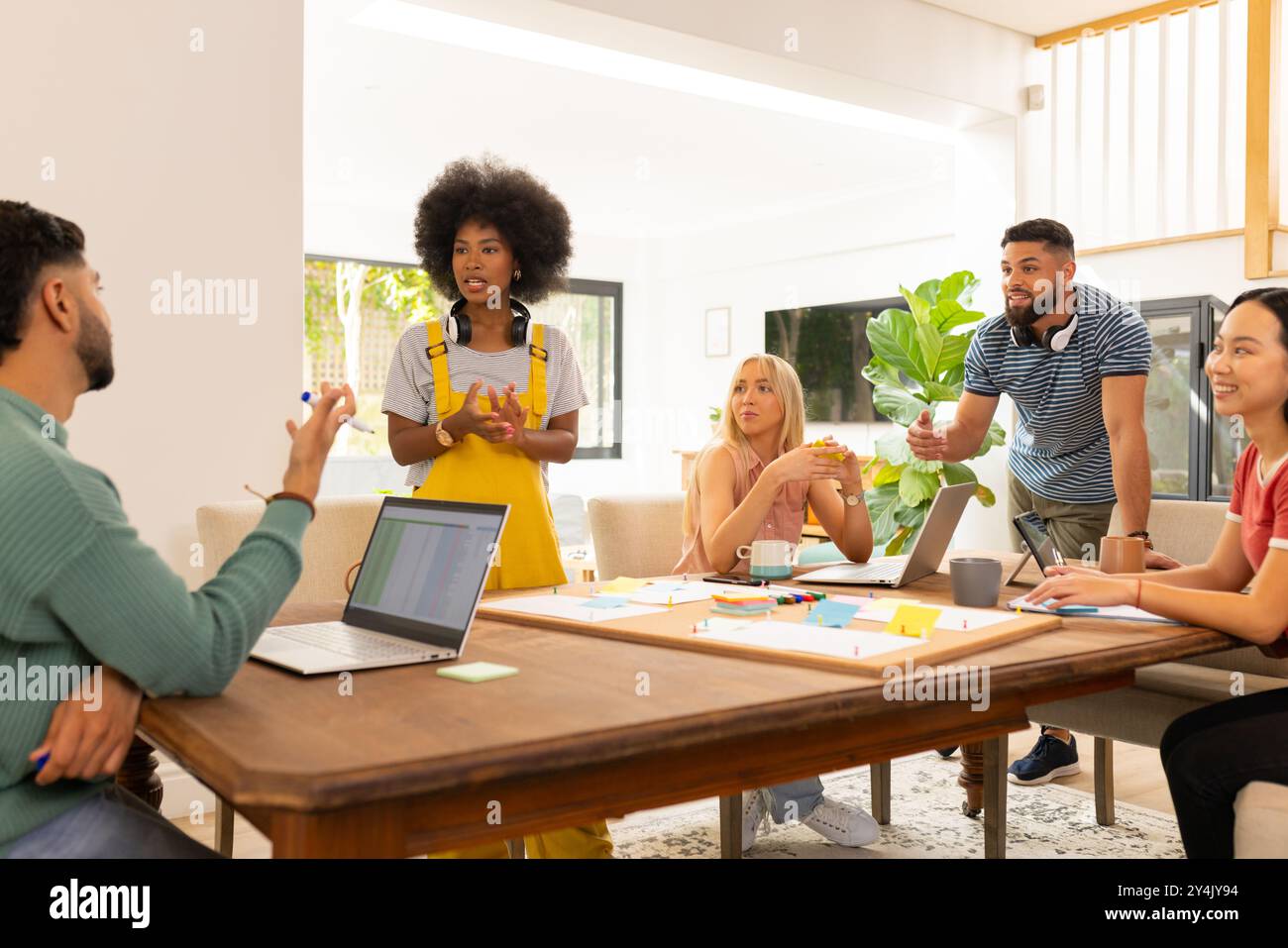 Start up business, Collaborating in meeting, young friends discussing ...