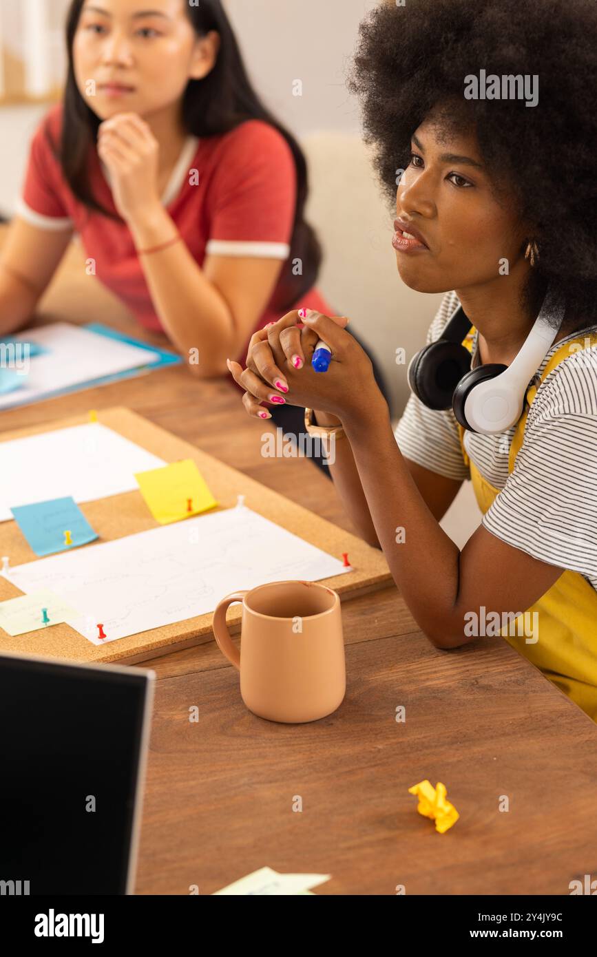 Start up business, collaborating on project, friends brainstorming ideas with documents Stock ...