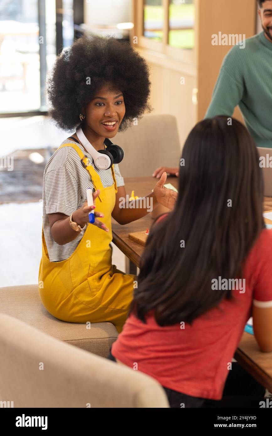 Start up business, Discussing ideas, young friends collaborating on ...