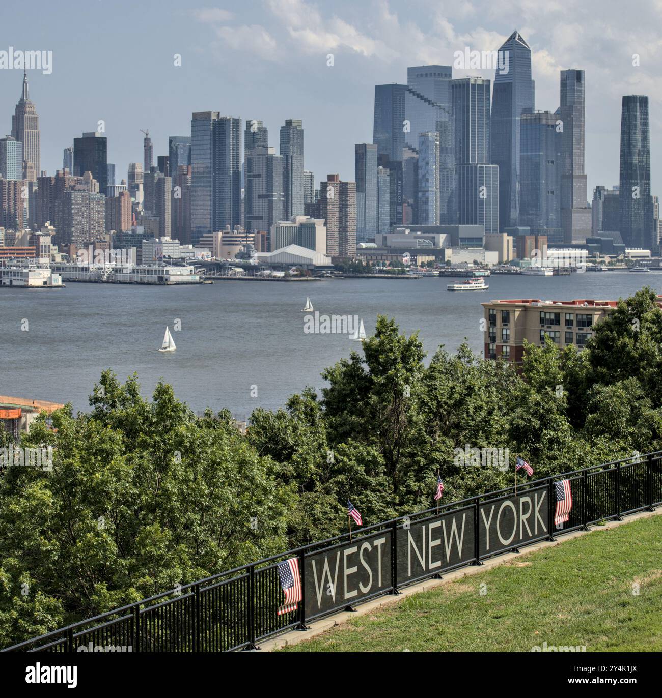 view of midtown manhattan skyline from a public park in west new york ...