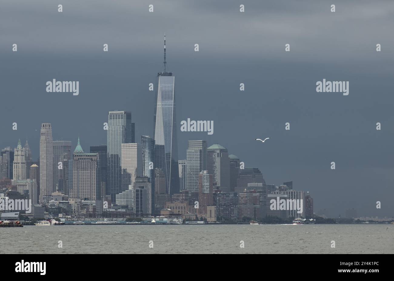 view of downtown manhattan skyline through fog and haze on stormy foggy hazy day (skyscrapers ...