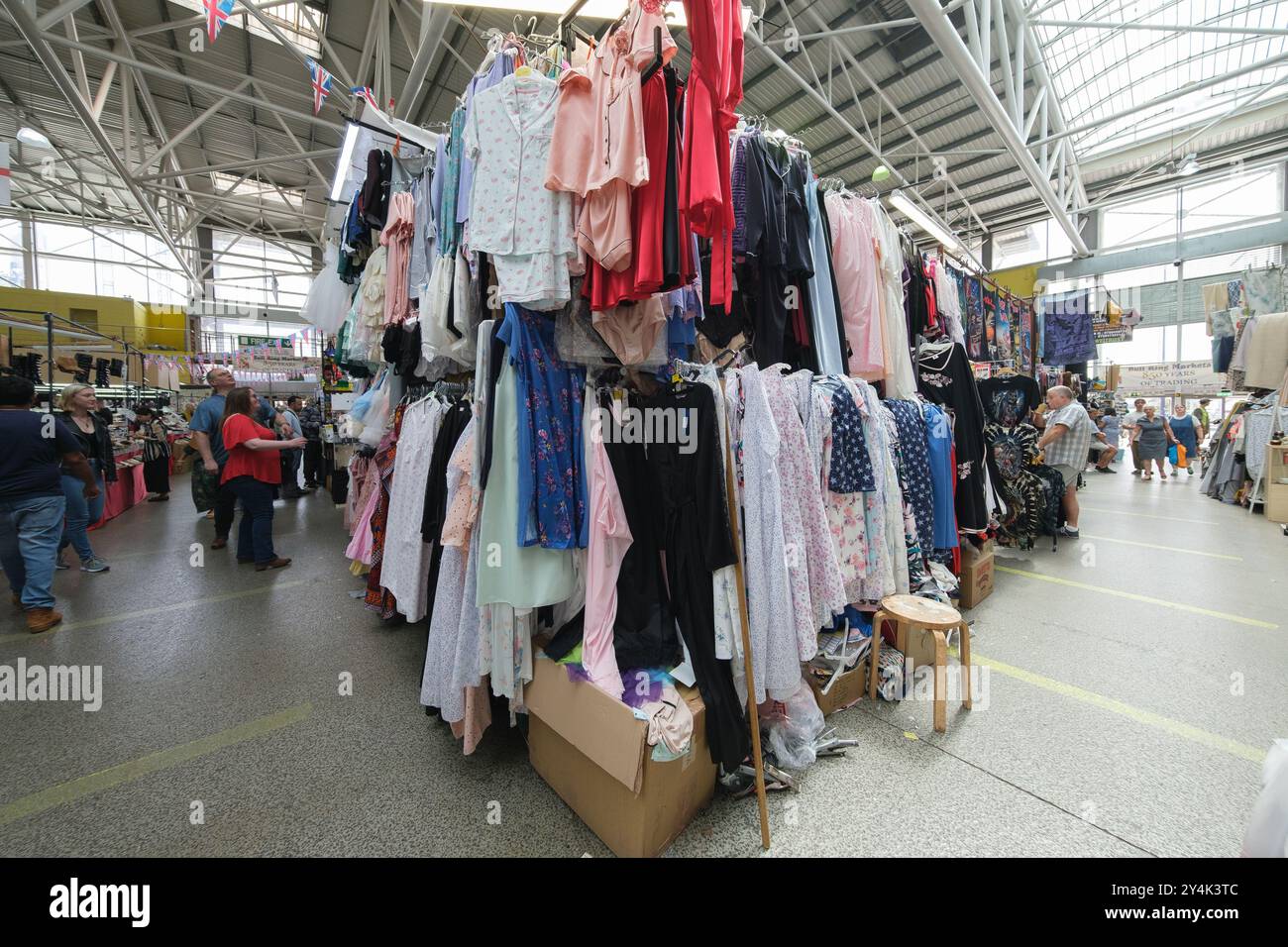 View of the stalls at Bullring Rag Market offering all kinds of items ...